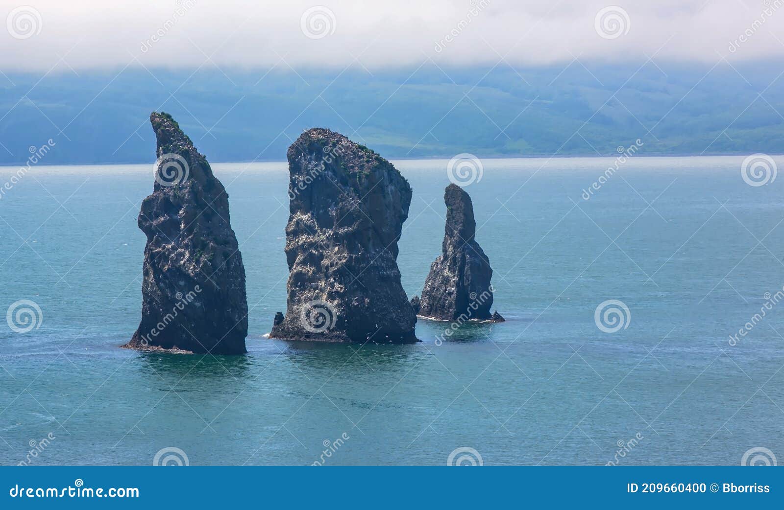 Three Brothers Rocks in Avacha Bay. Kamchatka Peninsula Stock Photo ...