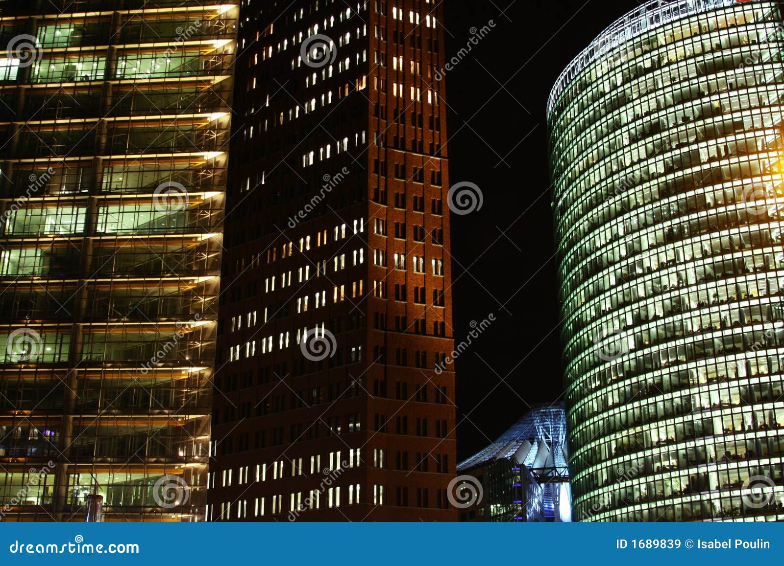 Three buildings at night stock image. Image of nighttime - 1689839