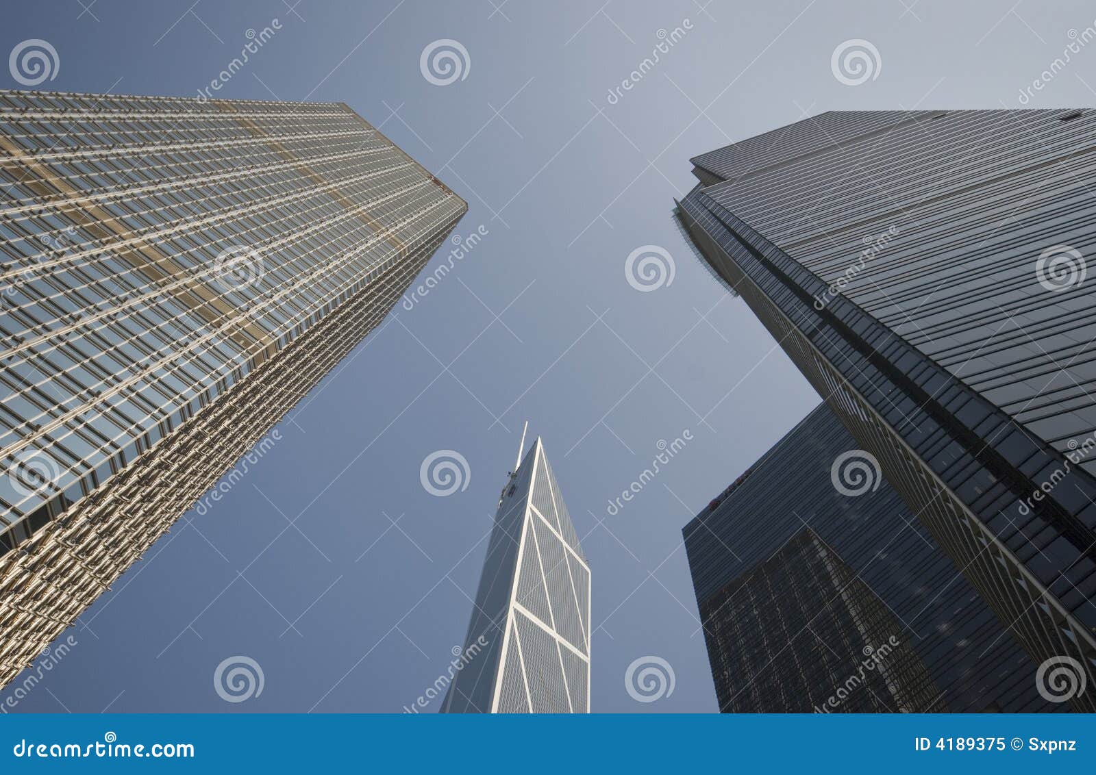 Three buildings stand tall stock image. Image of chrome - 4189375