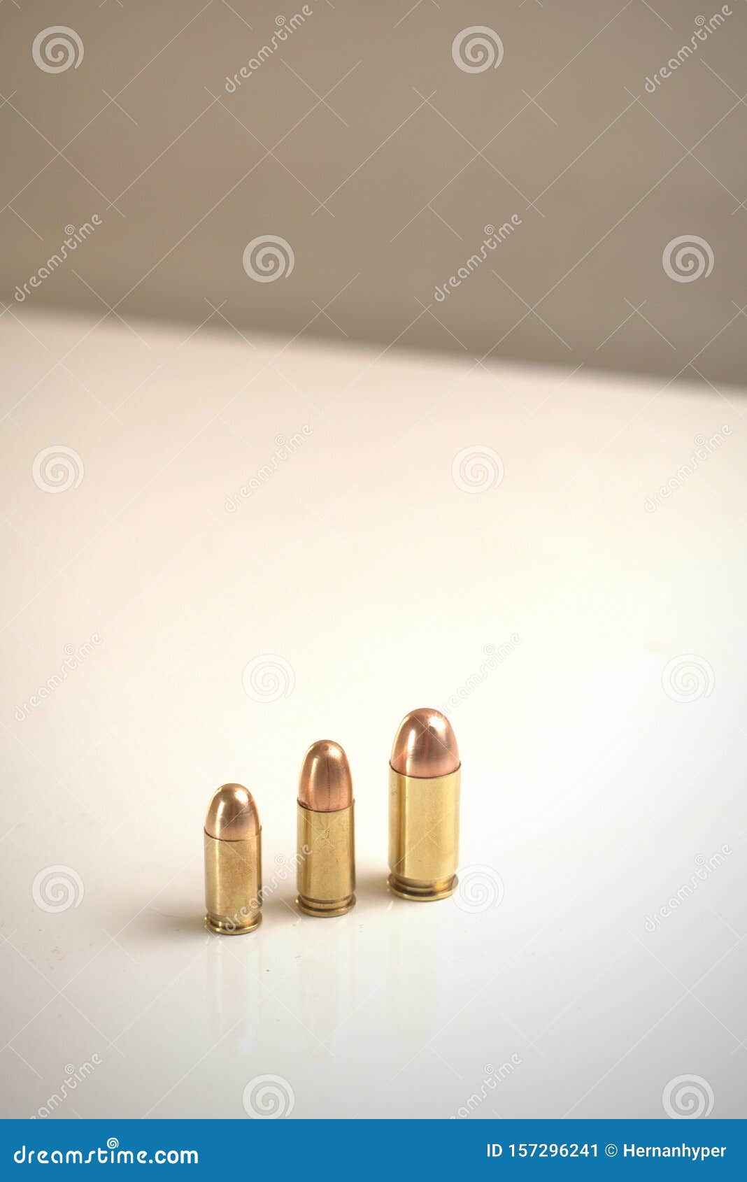 Three Bullets Against Blurred Kalashnikov Assault Rifle Background ...