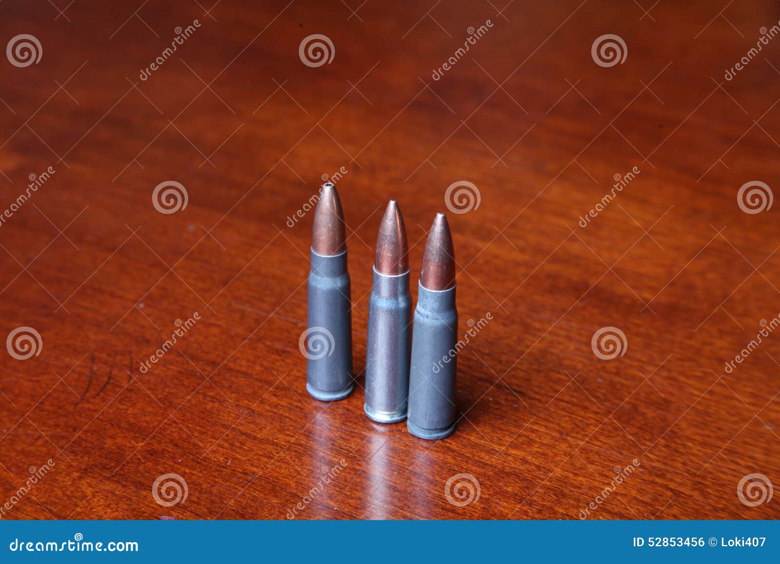Three Bullets Bottom Against Blurred Kalashnikov Assault Rifle ...