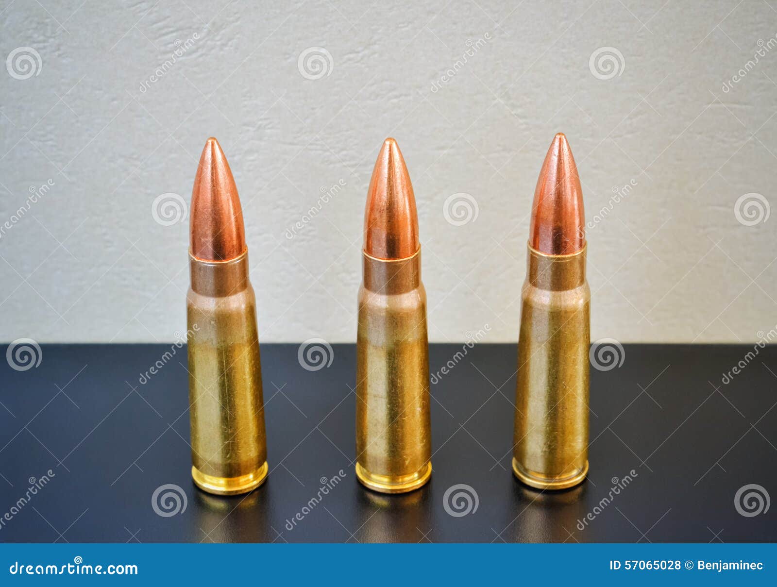 Three bullets stock photo. Image of defense, brass, criminal - 57065028