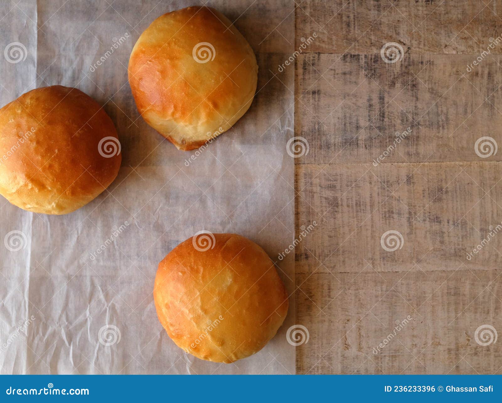 Three Burger Buns on Wood (Top View) Stock Photo - Image of buttercream ...
