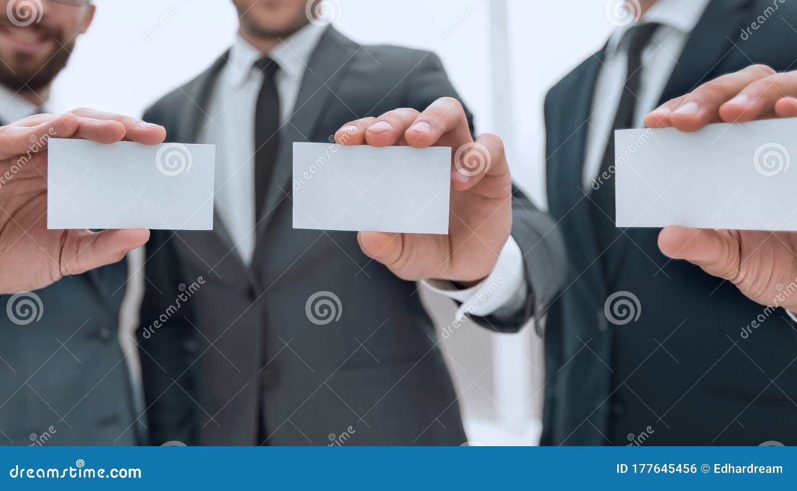 Three Business Partners Showing Their Business Card Form Stock Photo ...