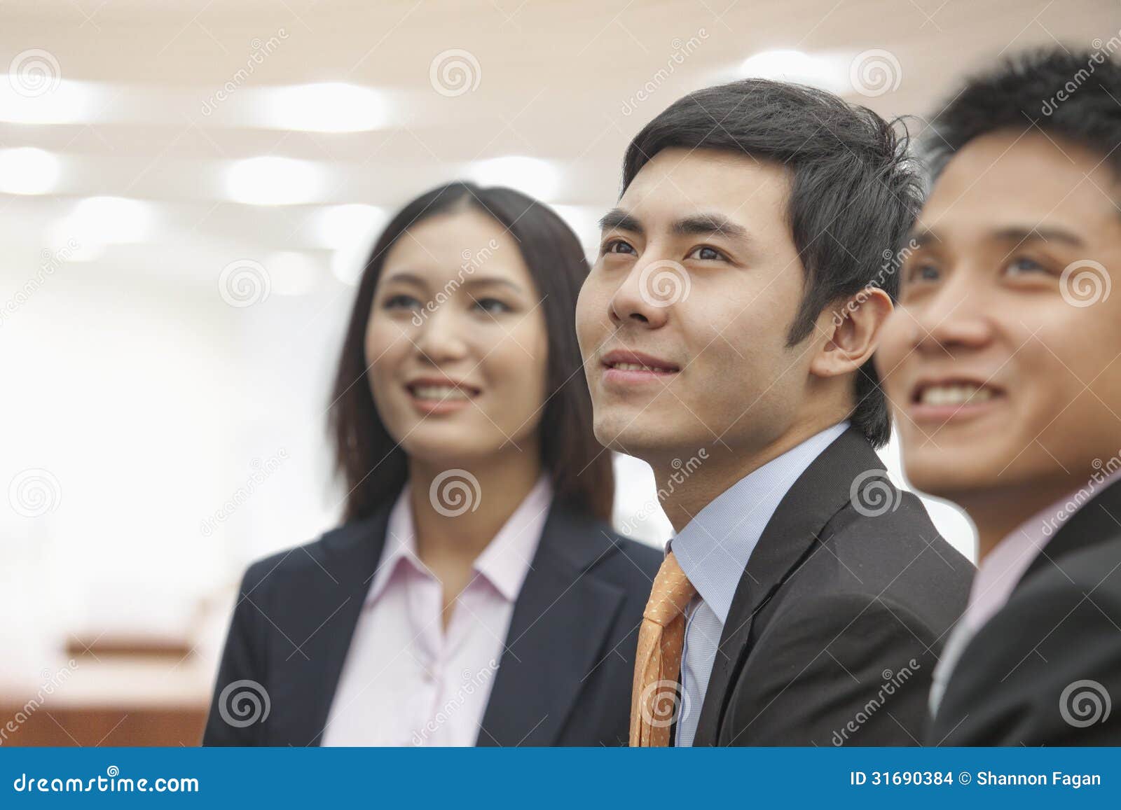 Three Business People Looking Away Stock Photo - Image of businesswoman ...