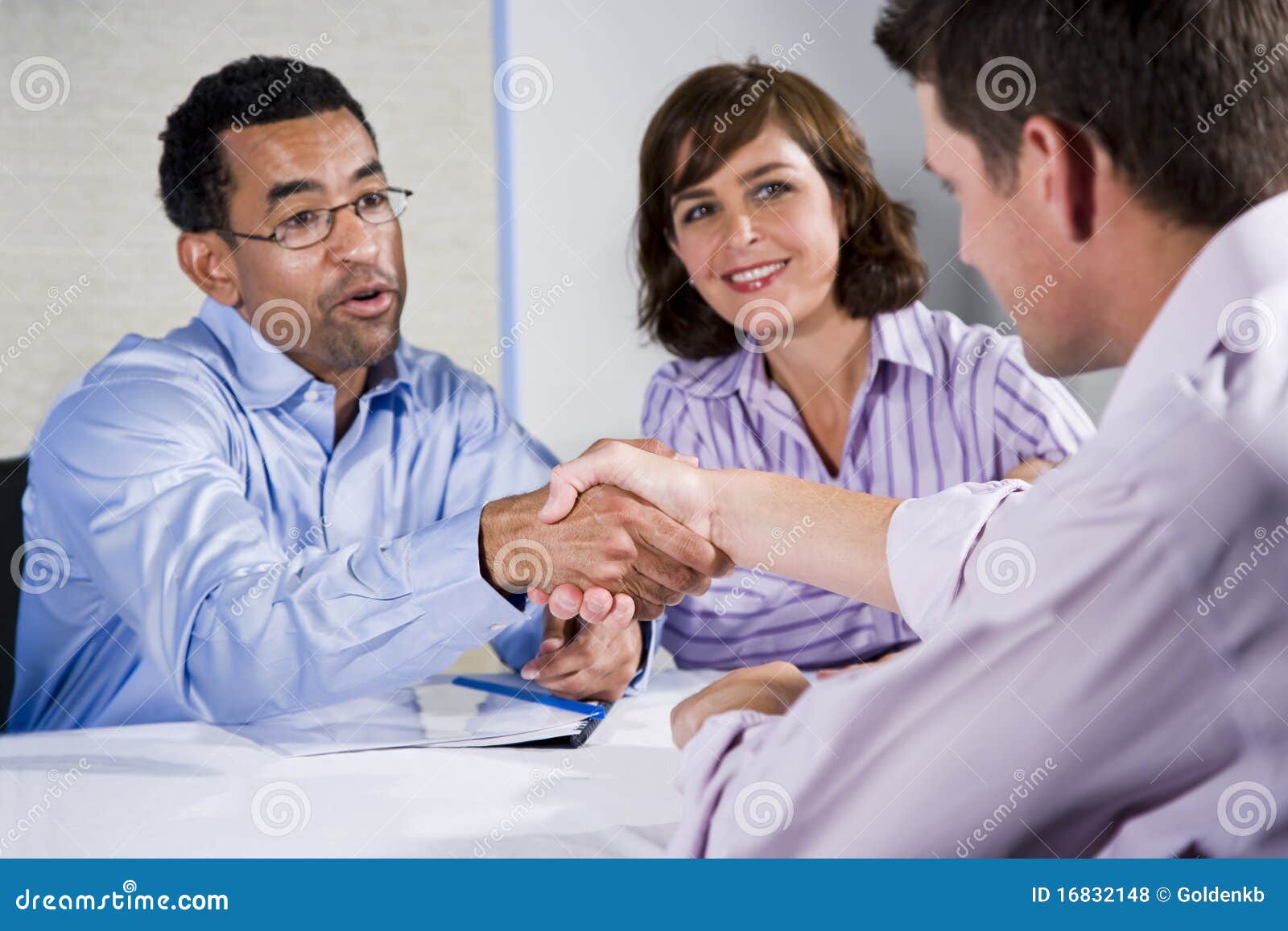 Three Business People Meeting, Men Shaking Hands Stock Photo - Image of ...