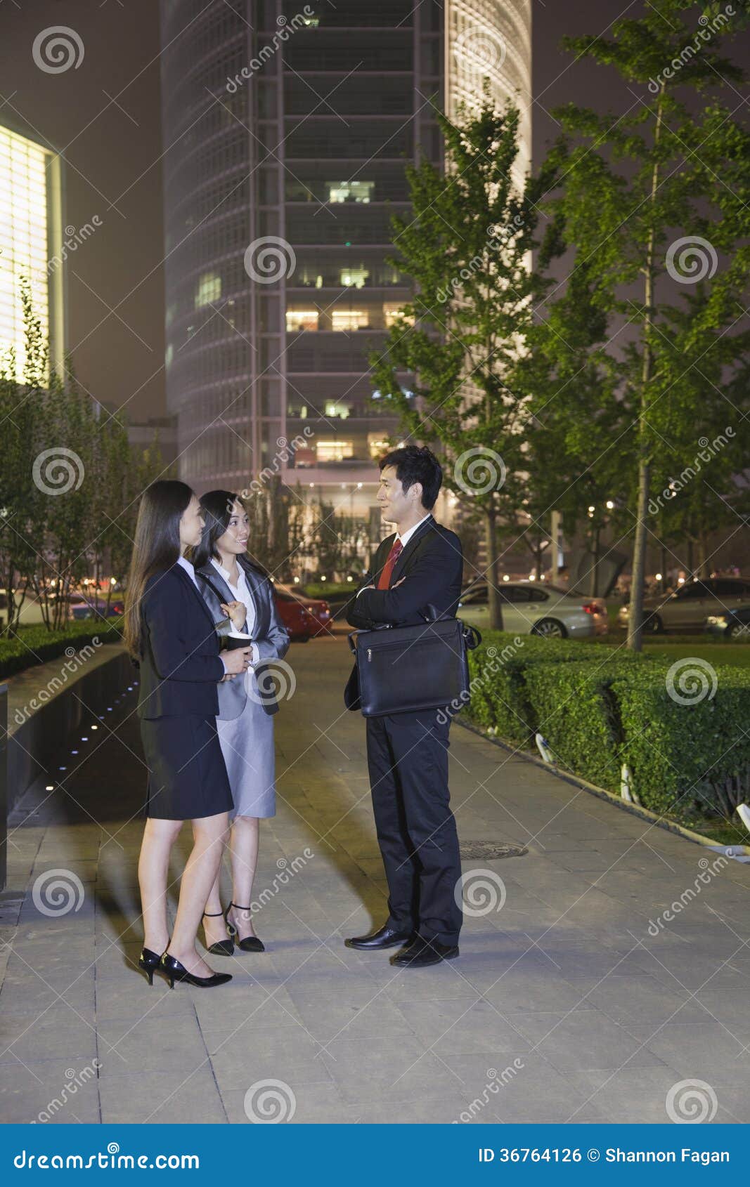Three Business People Talking Stock Photo - Image of business, face ...