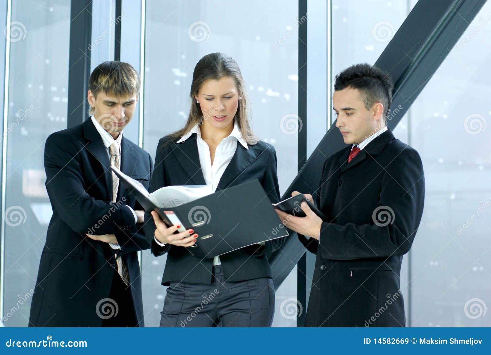 Three Business People are Working in an Office Stock Image - Image of ...