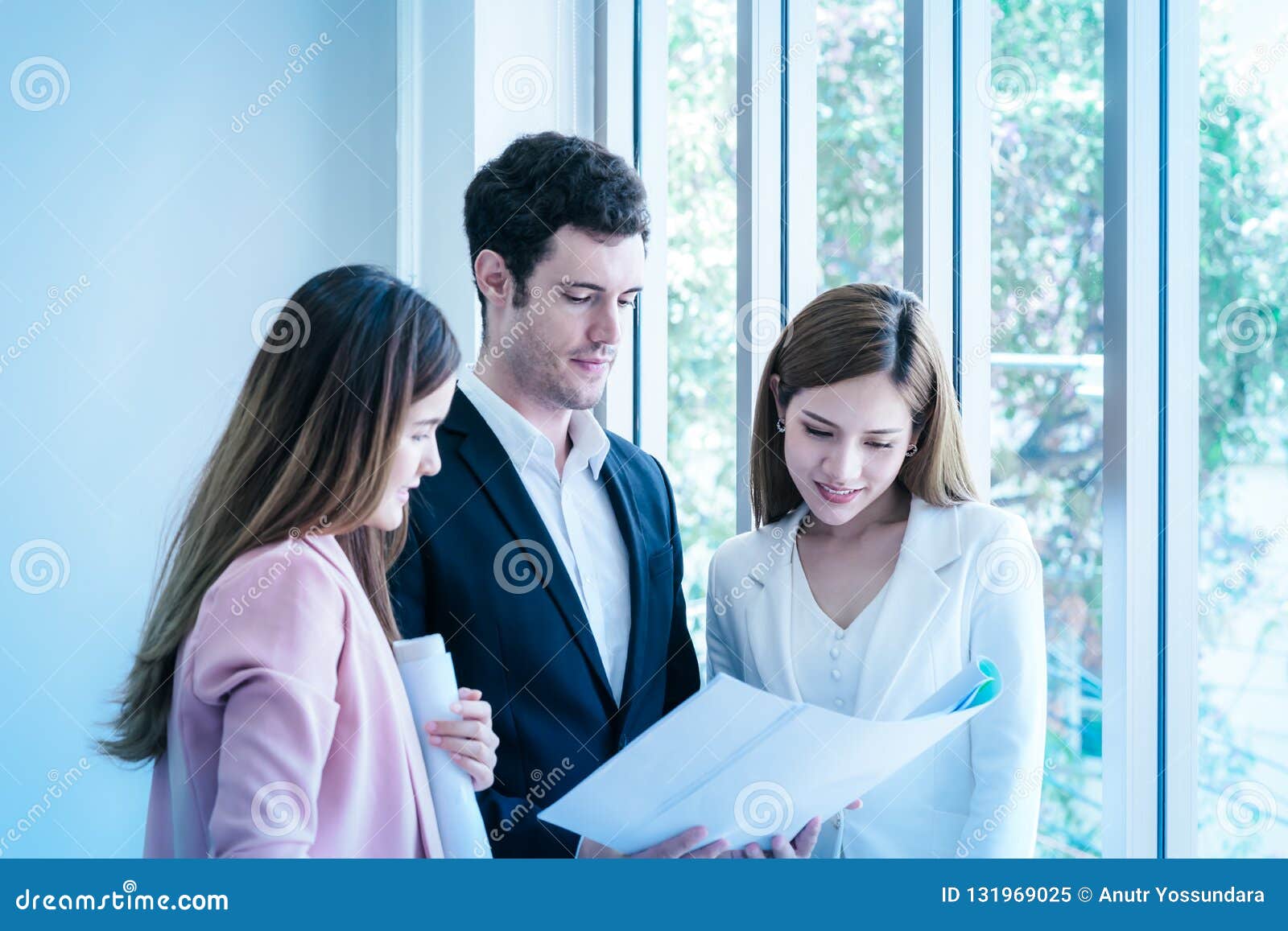 Three Business Team Discussing on Business in Team Meeting Stock Image ...