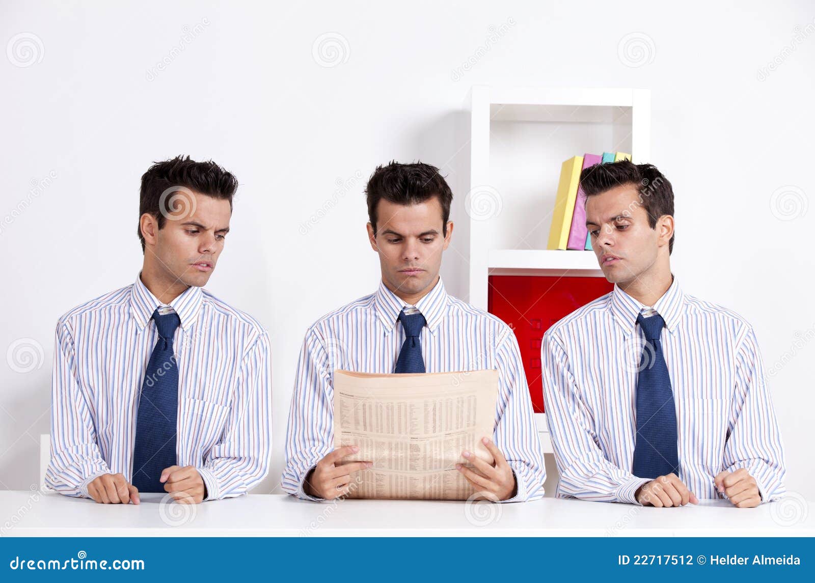 Three Businessman Reading a Newspaper Stock Photo - Image of ...