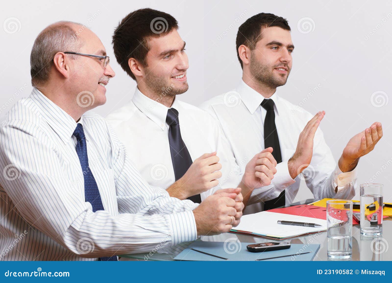 Three Businessman Sitting at Table during Meeting Stock Photo - Image ...