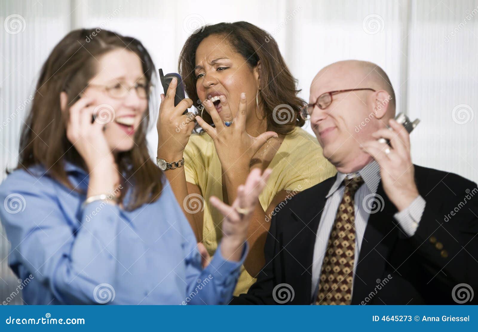 Three Businesspeople on Cell Phones Stock Image - Image of boss ...