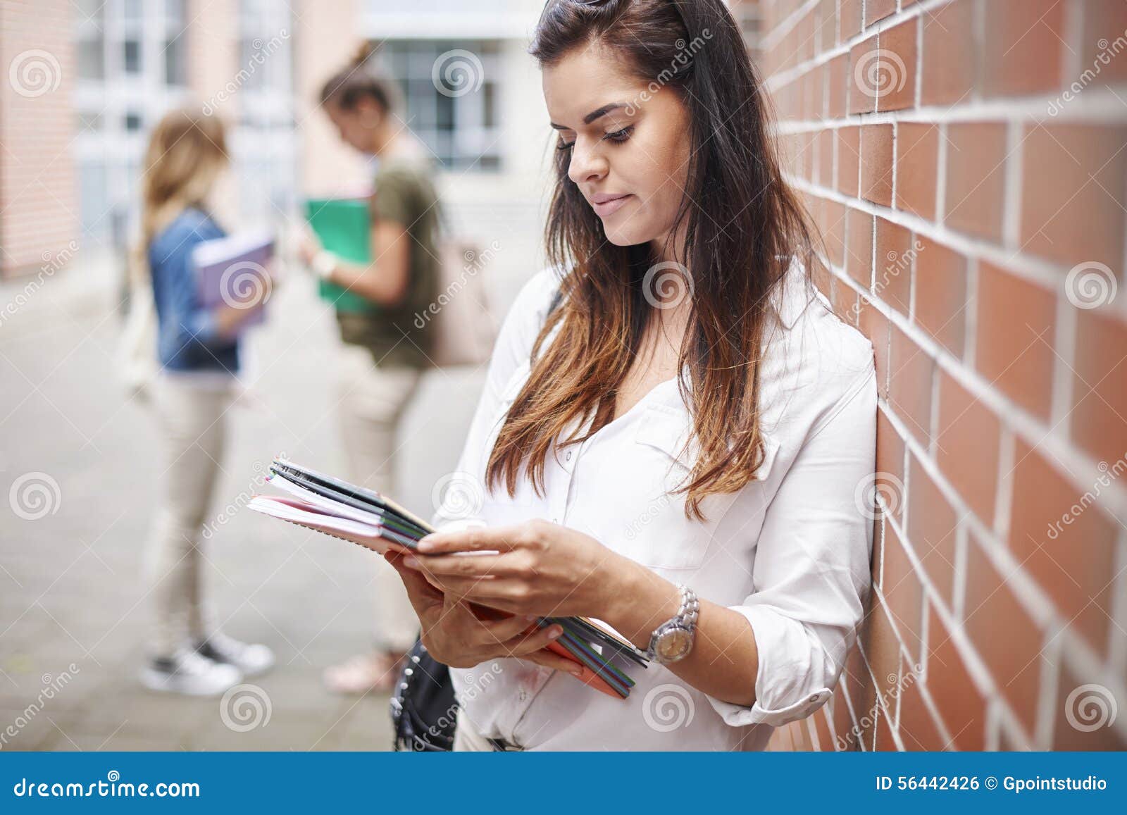 Three Busy Students on Campus Stock Photo - Image of outdoors ...