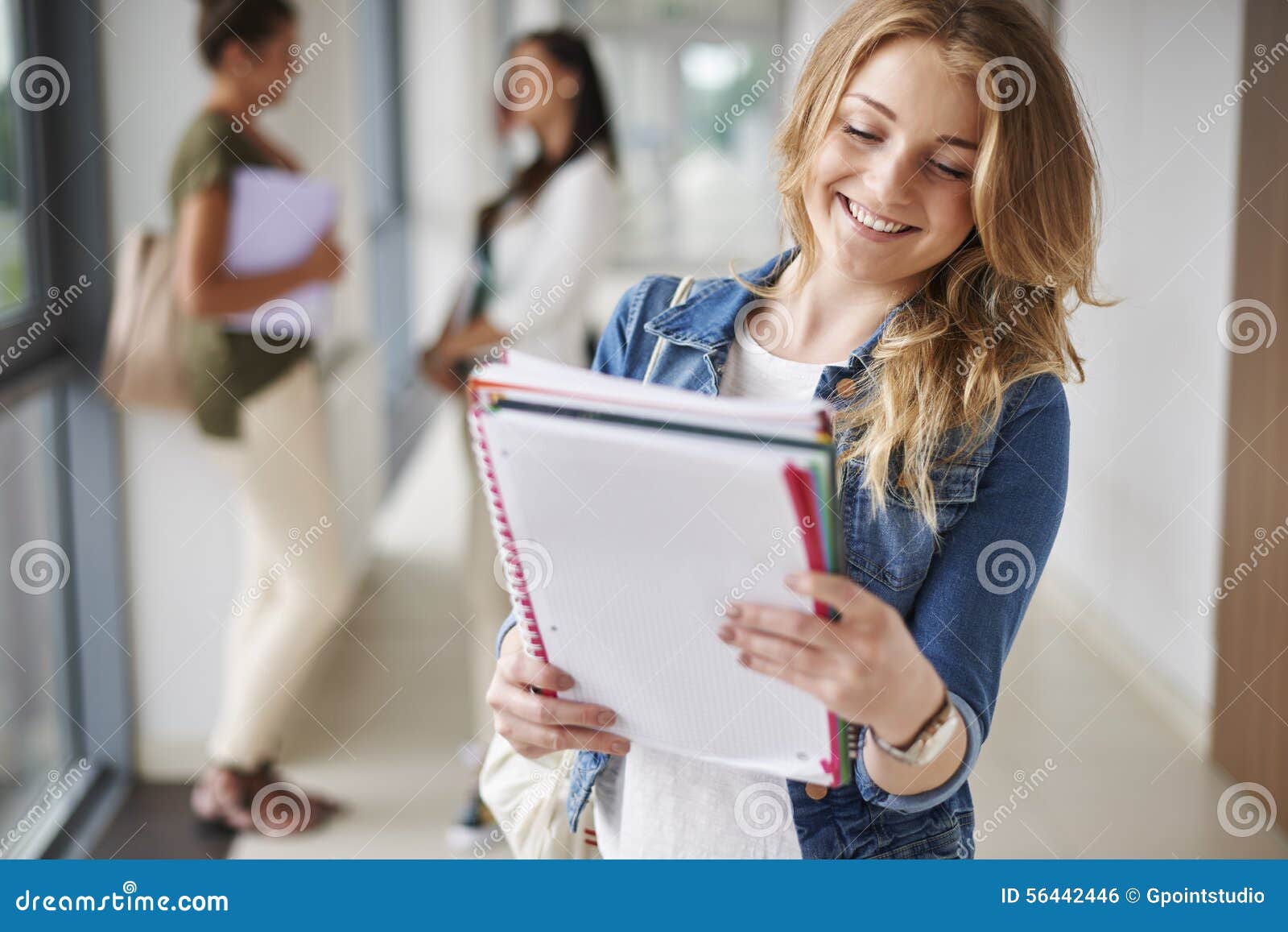 Three Busy Students on Campus Stock Photo - Image of corridor, notebook ...