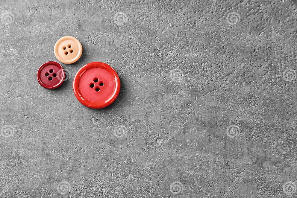 Three Buttons on Grey Background Stock Photo - Image of three, sewing ...