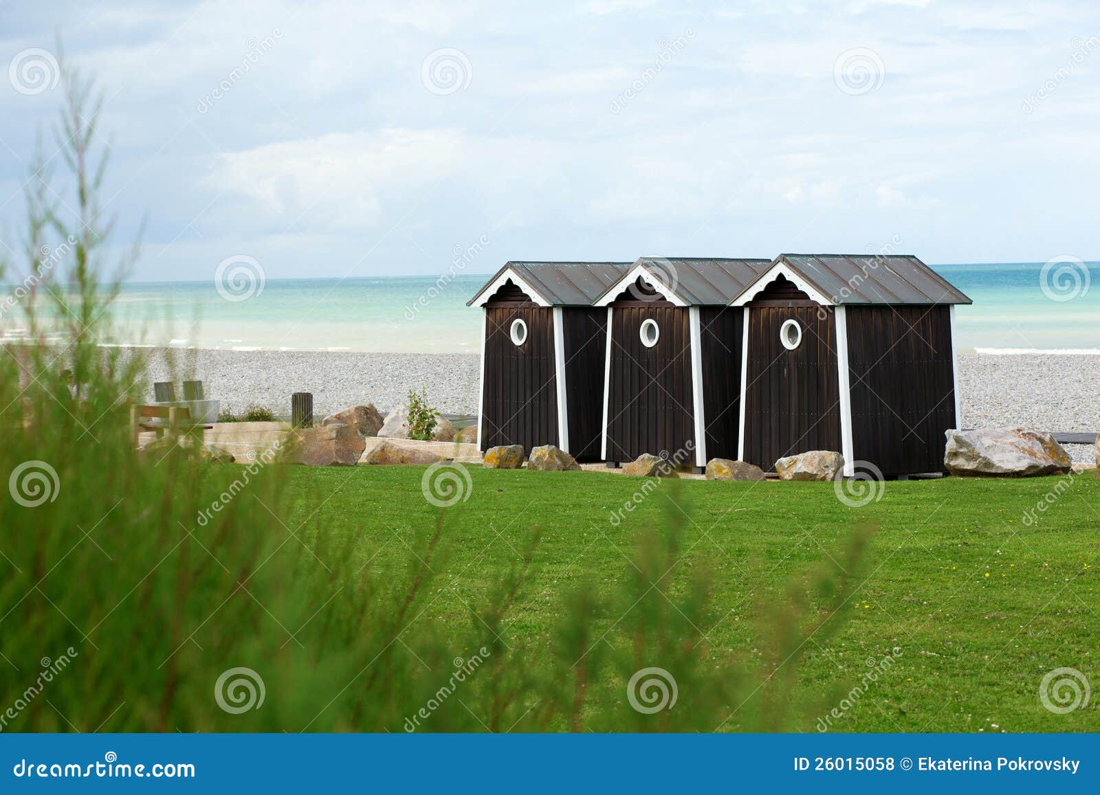 Three cabanas on a beach stock photo. Image of natural - 26015058