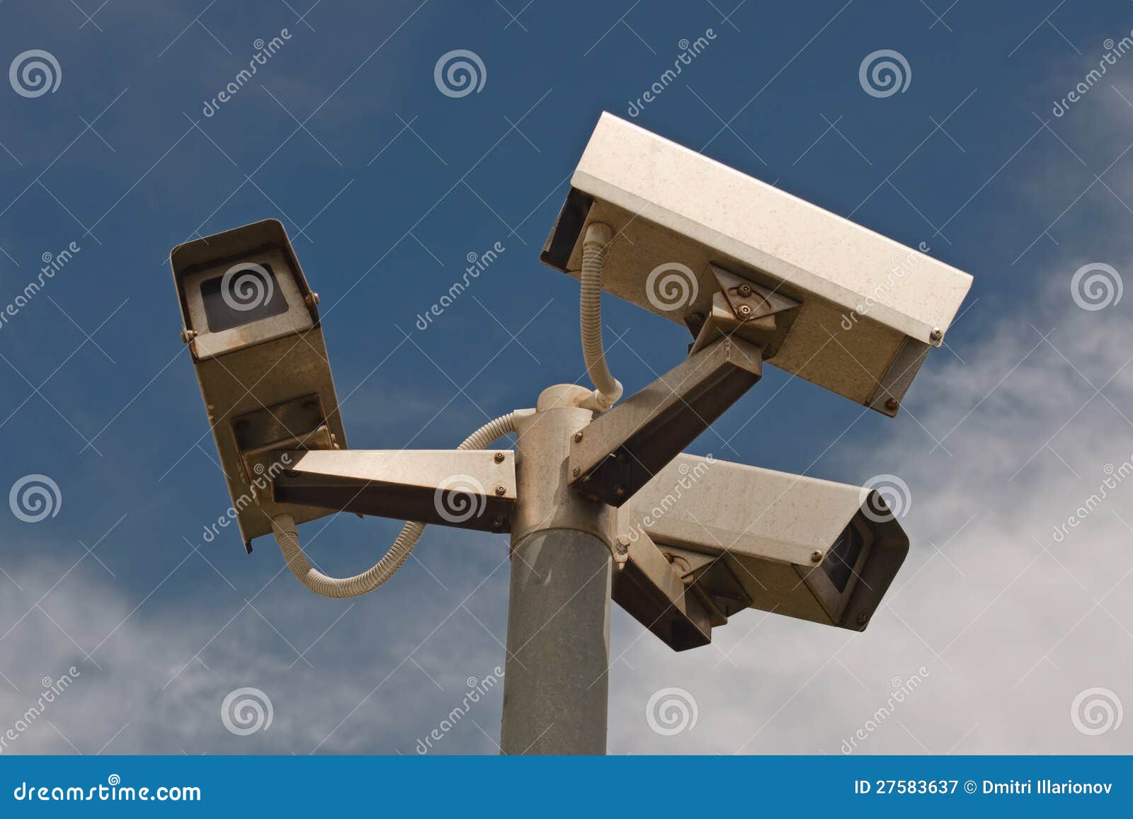 Three cameras on post stock image. Image of blue, look - 27583637