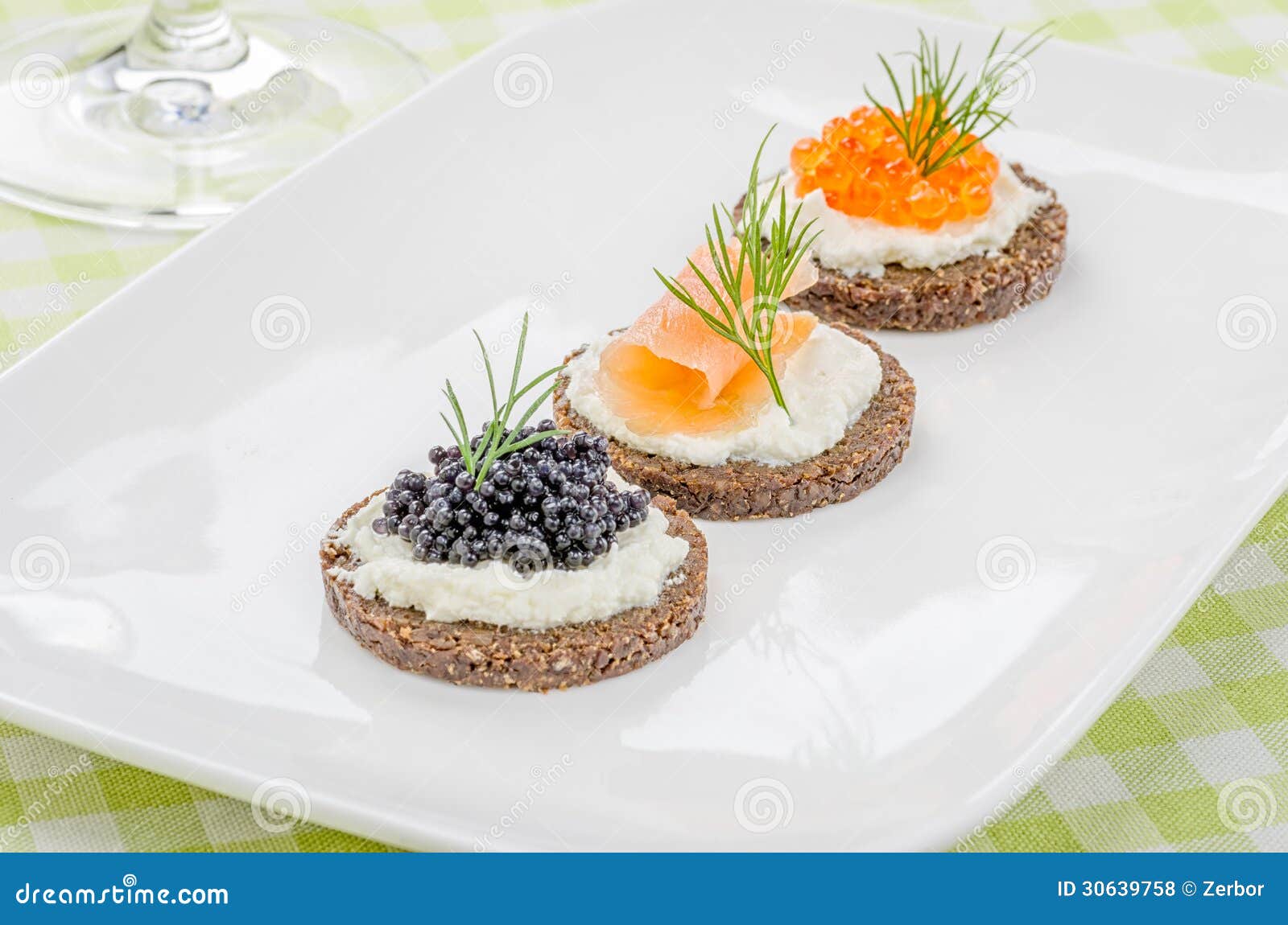 Three Canapes with Salmon and Caviar Stock Photo - Image of ...