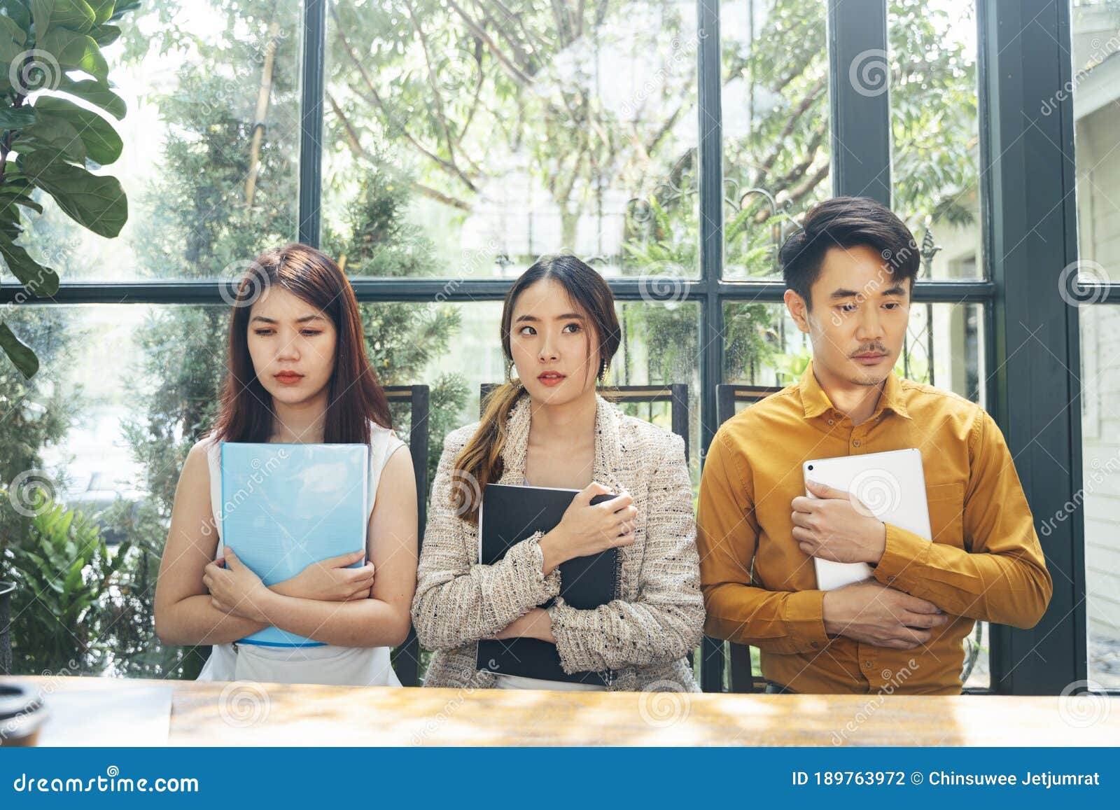 Three Candidates Waiting for Interview Stock Photo - Image of ...