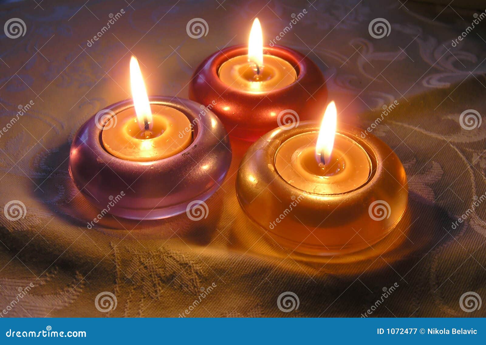 Three candle lights stock image. Image of tabletop, candle - 1072477