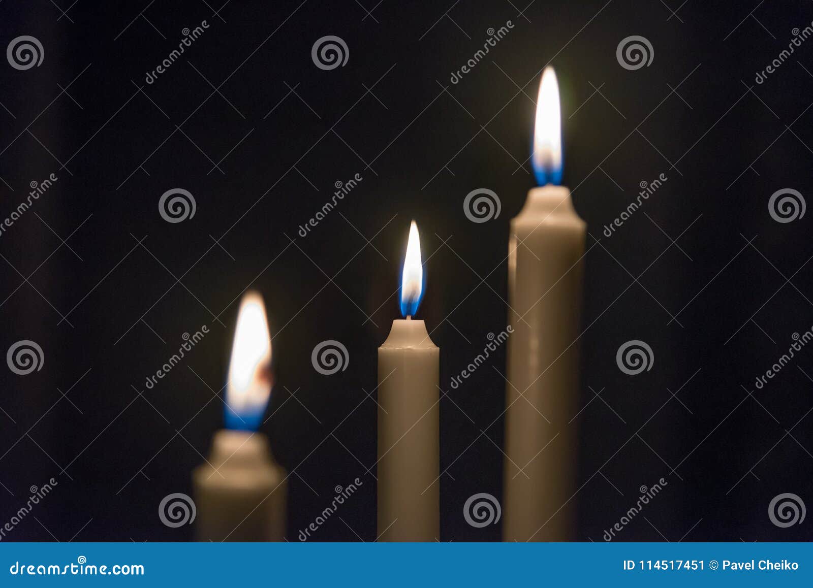 Three candles light stock image. Image of candlelight - 114517451