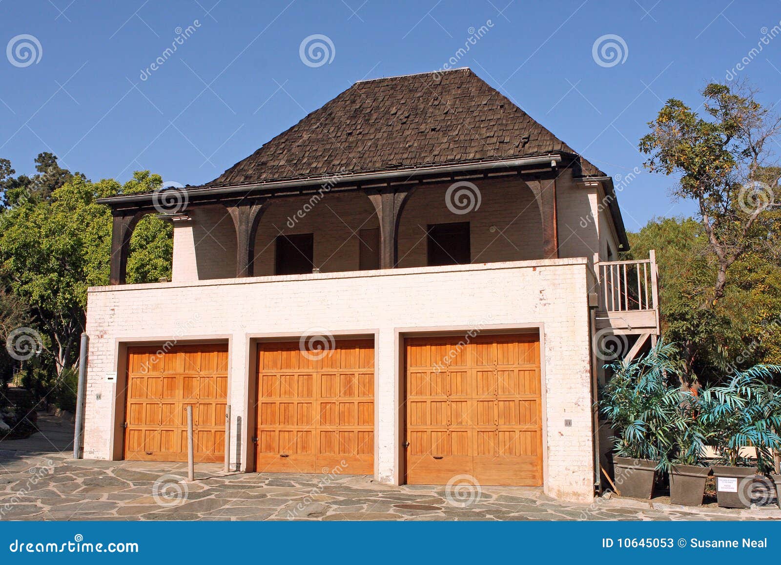 A three-car garage stock image. Image of three, hill - 10645053