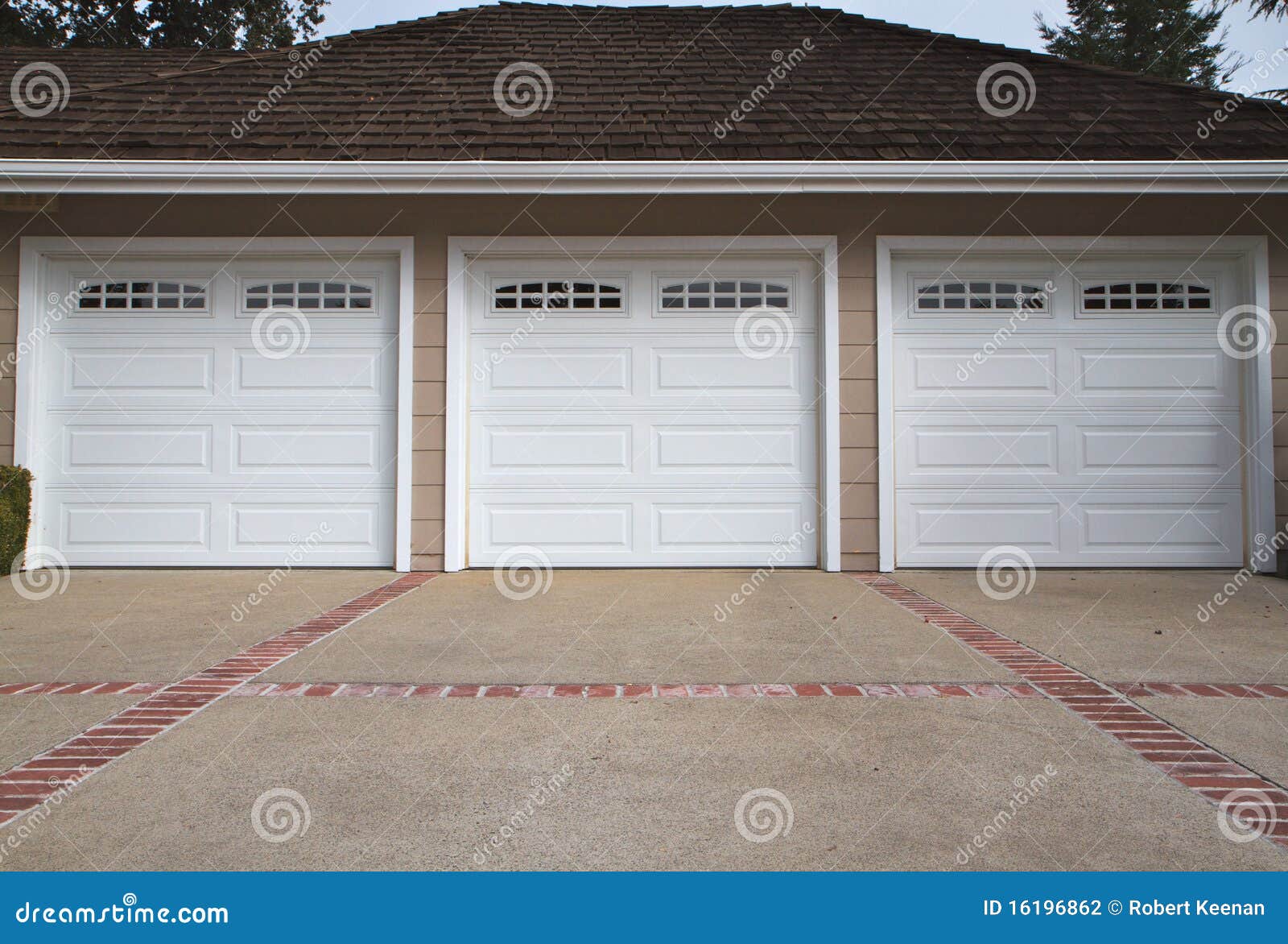 Three car garage close stock photo. Image of construction - 16196862