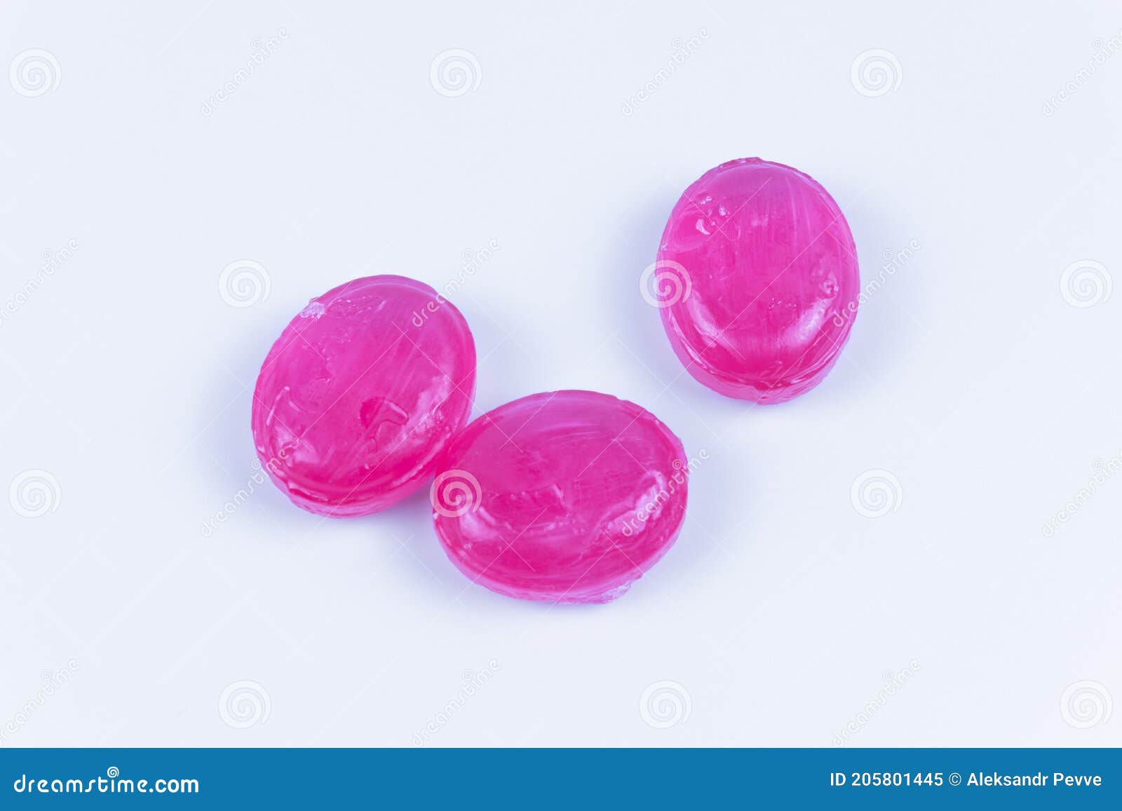 Three Caramels of the Same Pink Color on a White Background Stock Image ...