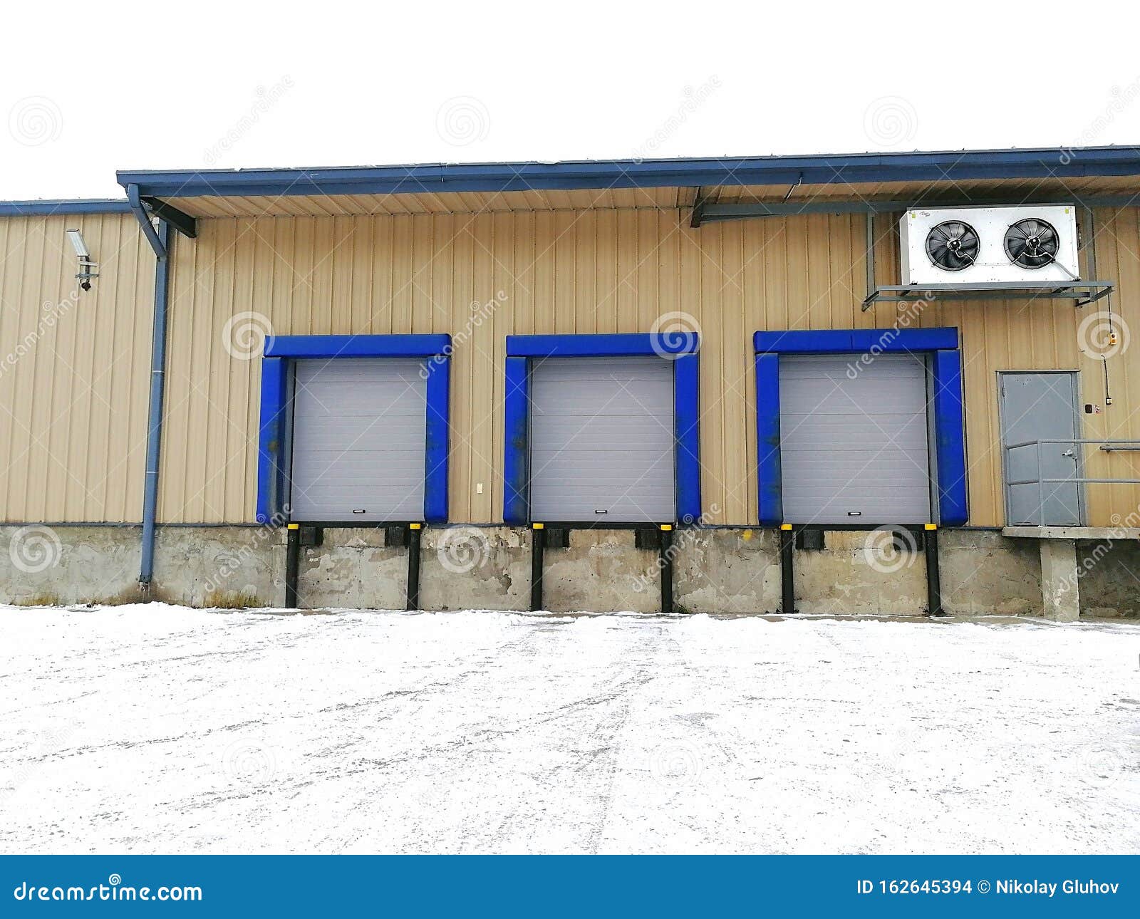 Three Cargo Gates for Loading and Unloading Vans of Trucks. Stock Photo ...
