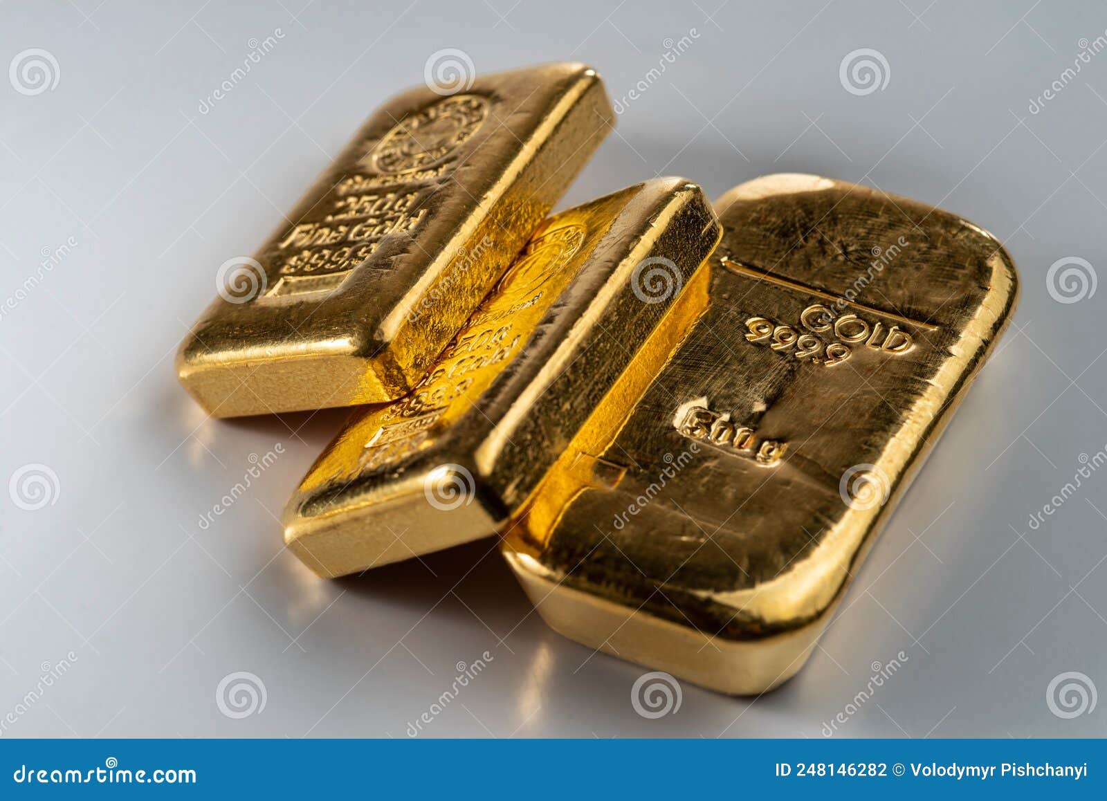 Three Cast-iron Teapots In A Row On A Black Background. Red, Yellow And ...