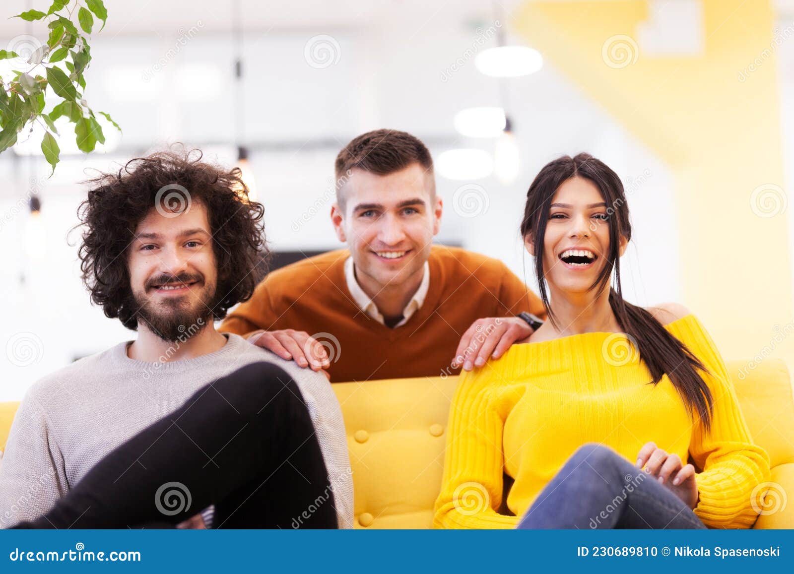 Three Caucasian Positive and Happy Colleagues in a Modern Office Stock ...