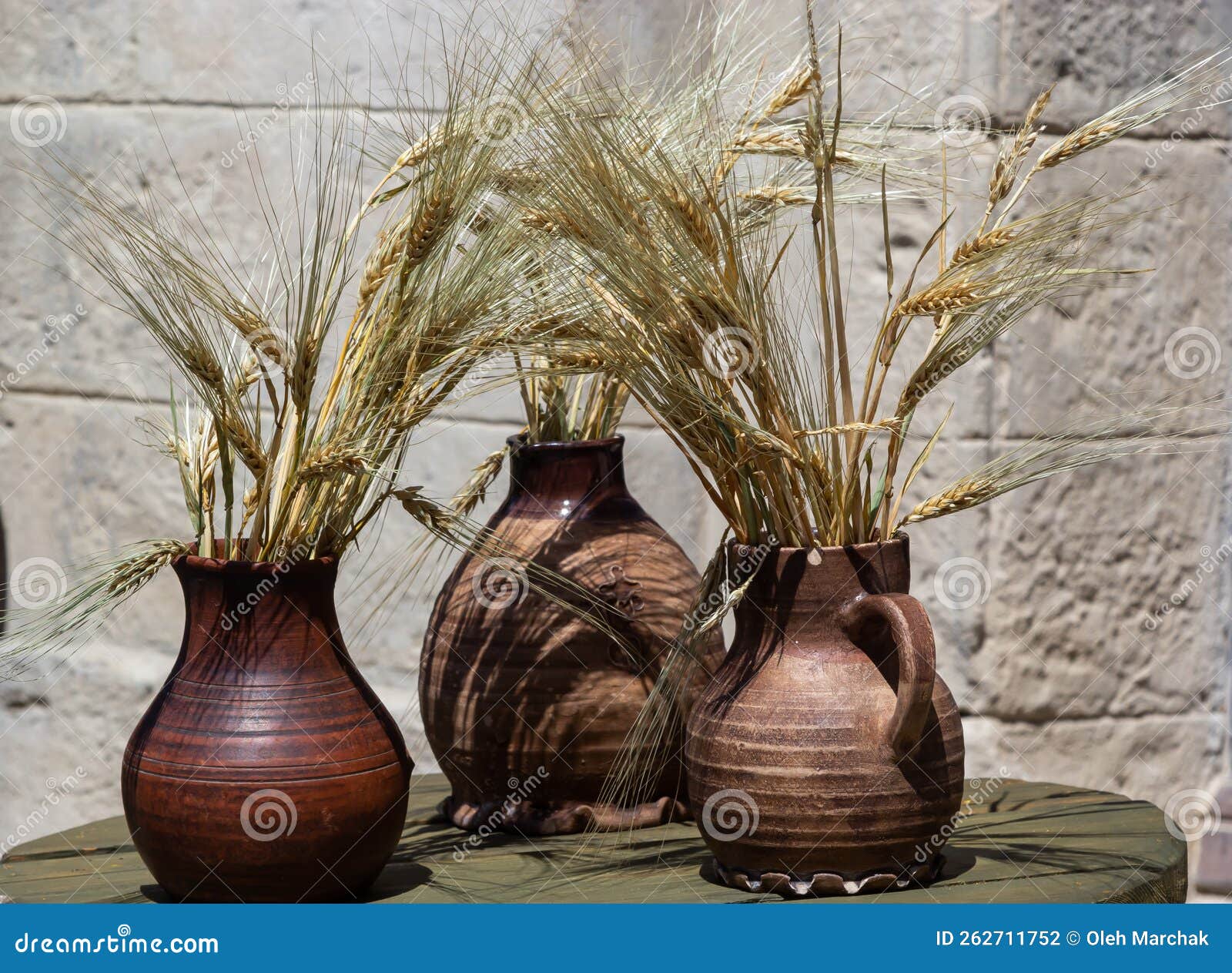 Three Ceramic Pots with Spikelets, Corn Stand on the Windowsill Stock ...