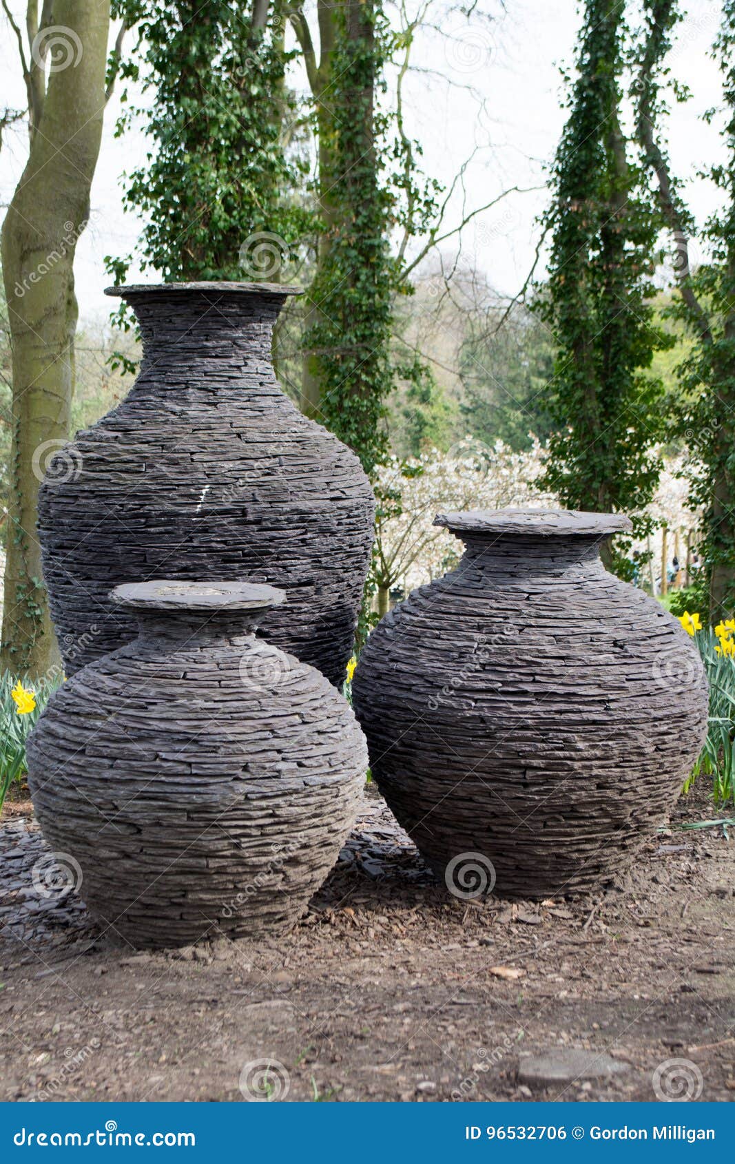 Three Ceramic Textured Vases in an Outdoor Garden Stock Photo - Image ...