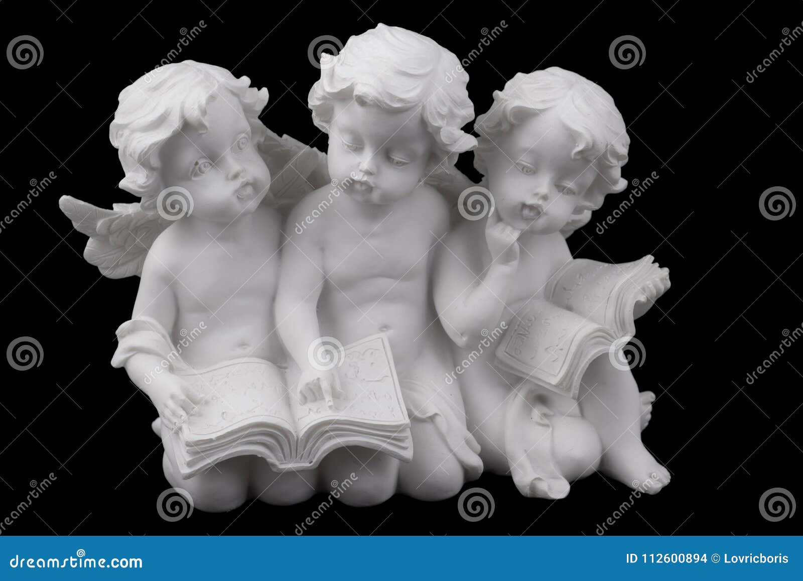 White Angels Statue With White Flowers On Black Background Stock Image ...