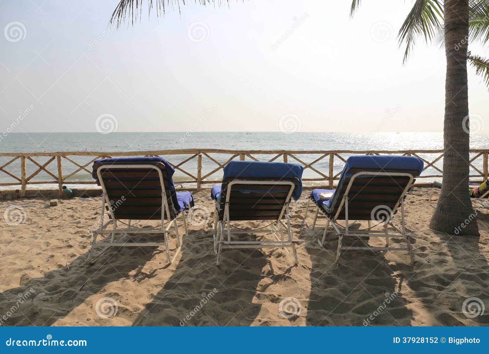 Three Chairs by the Beach Shore. Stock Photo - Image of chair, empty ...