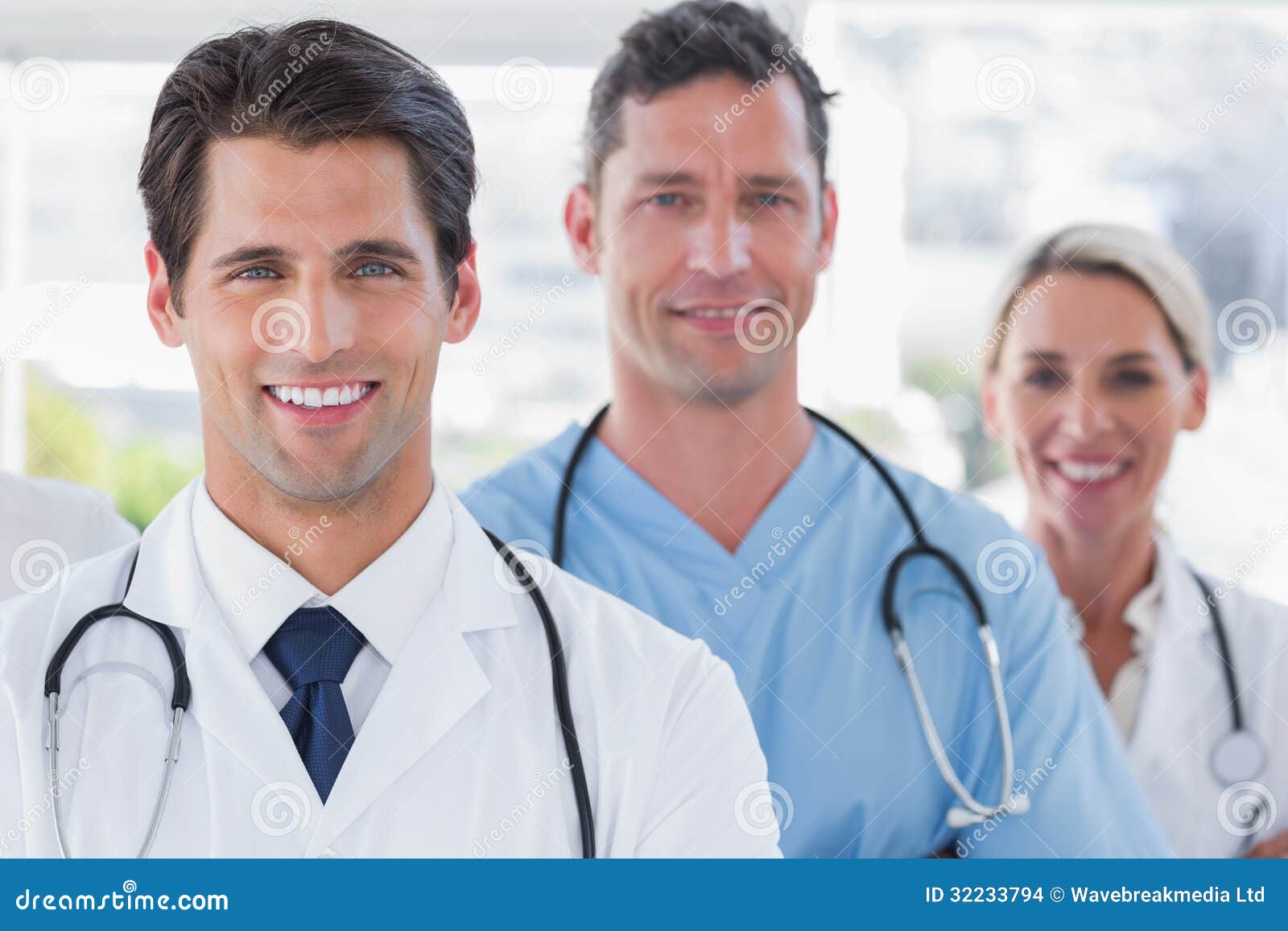 Three cheerful doctors stock photo. Image of colleagues - 32233794
