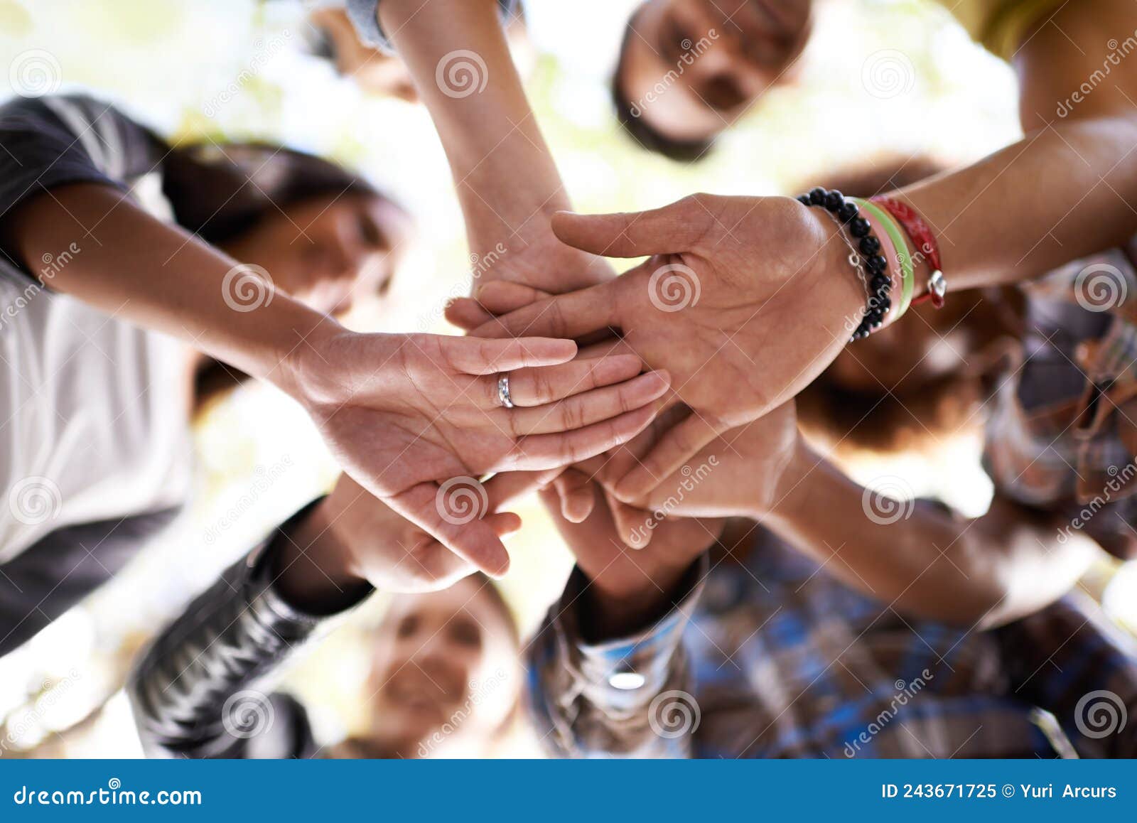 Three Cheers for Summer. a Group of Friends Standing in a Huddle with ...