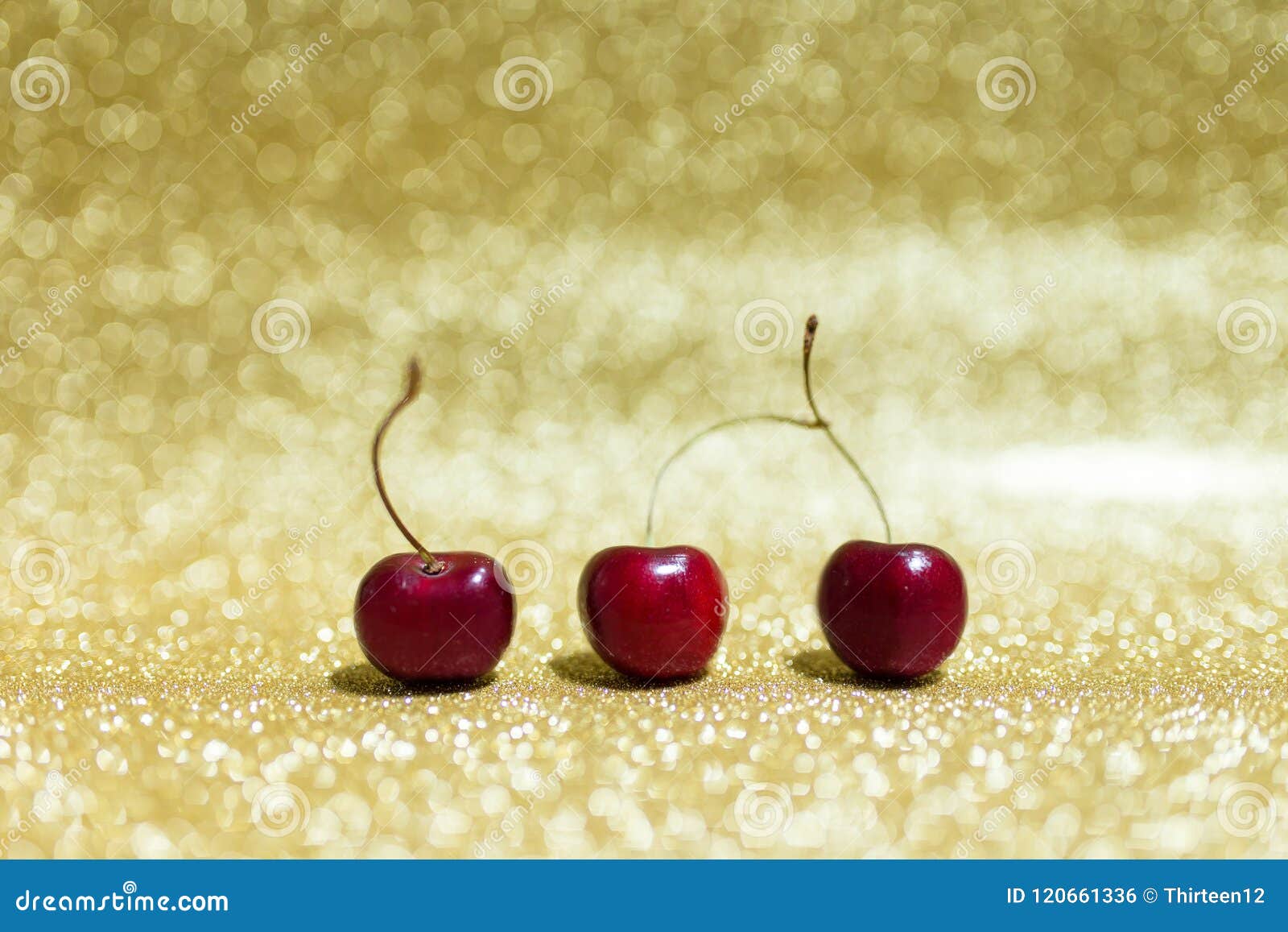Three Cherry on Glitter Background Stock Photo - Image of background ...