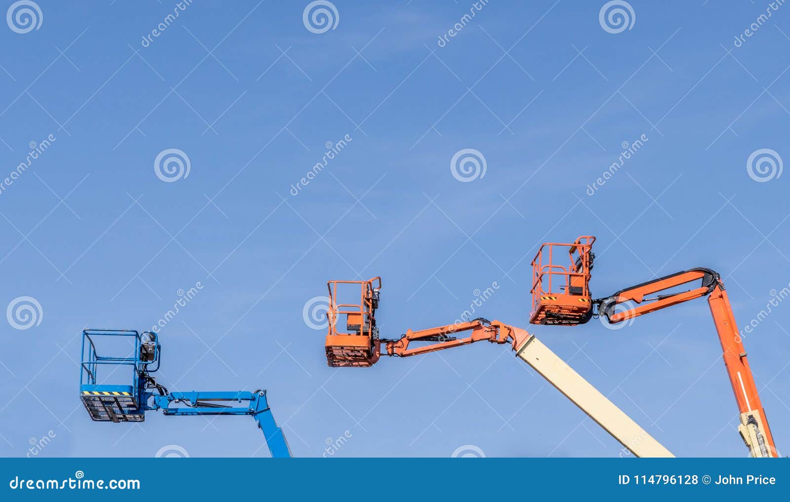Three Cherry Picker Machines Stock Photo - Image of moving, steel ...