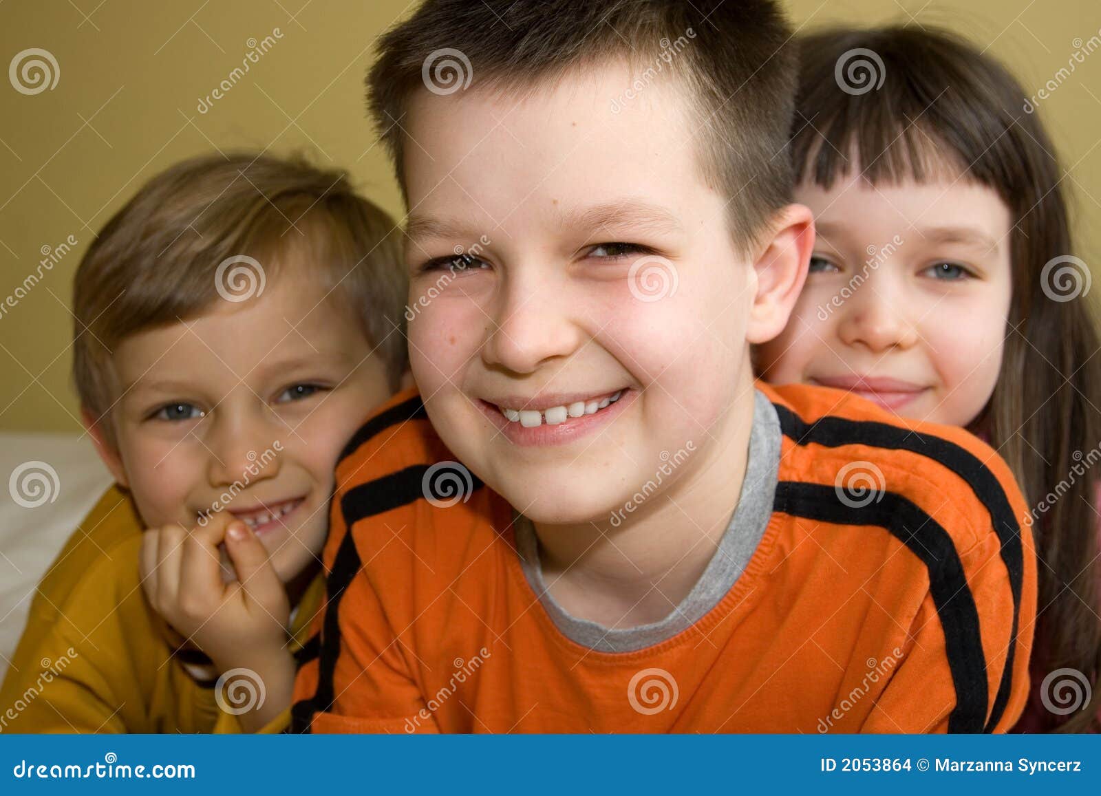 Three Children with Beaming Smiles Stock Photo - Image of contentment ...