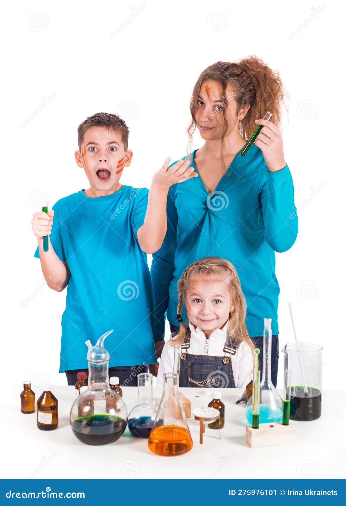 Three Children Doing Experiments with Chemical Liquids at the Lesson ...