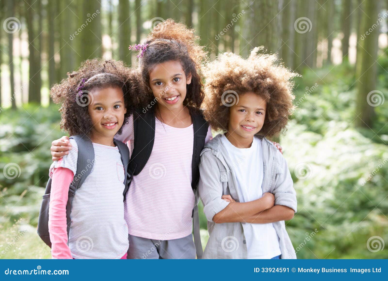 Three Children Exploring Woods Together Stock Image - Image of female ...