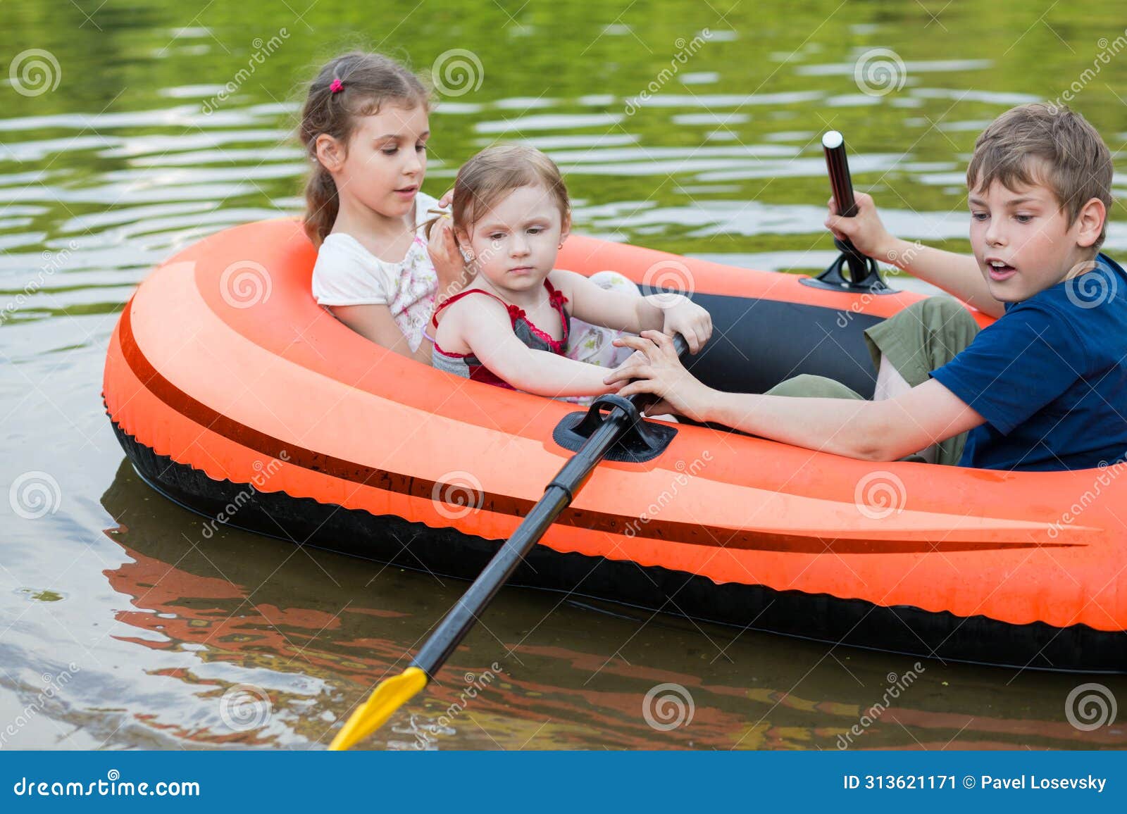Three Children Floating in a Rubber Boat on the Stock Image - Image of ...