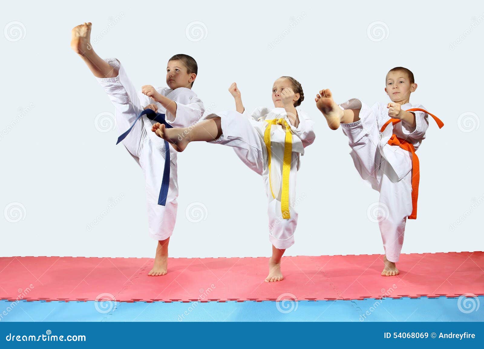 Three Children in Karategi are Beating Kick Leg Forward Stock Image ...