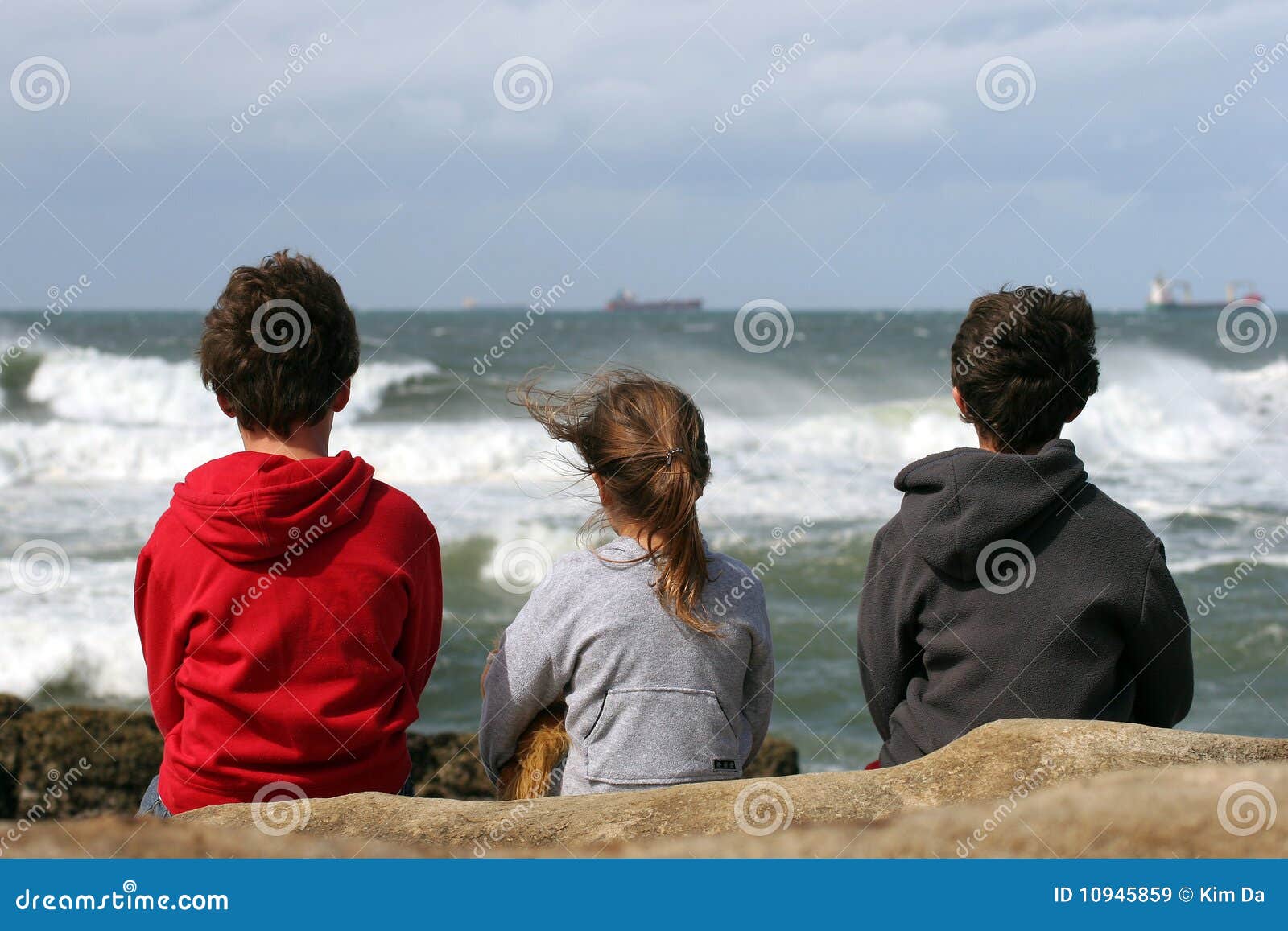 Three Children Looking Out To Sea Stock Image - Image of beach, cruise ...