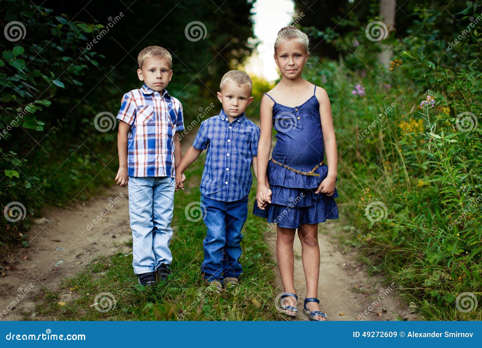 Three children on meadow stock image. Image of children - 49272609