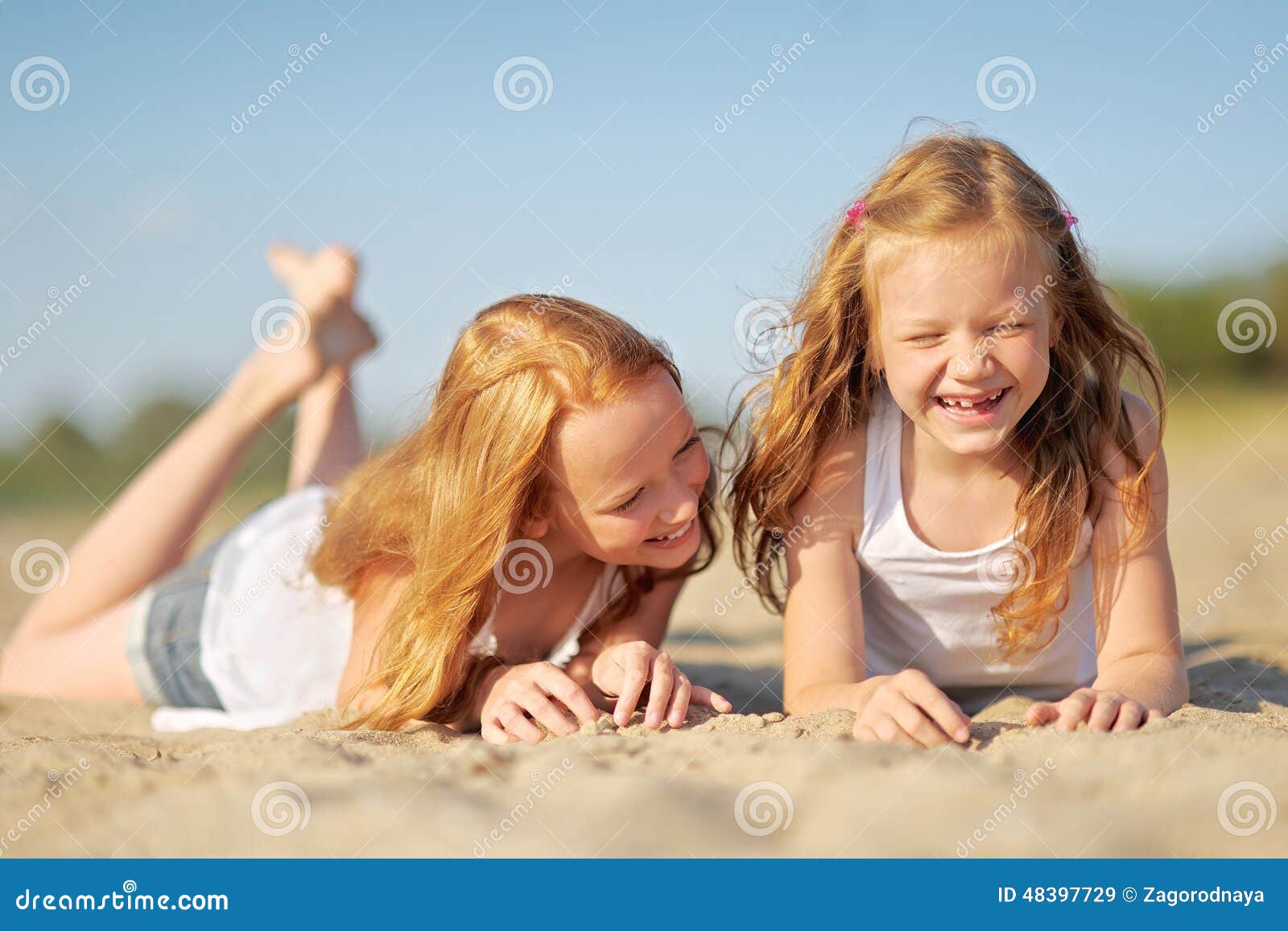 Three Children Playing on Beach Stock Image - Image of laughing ...