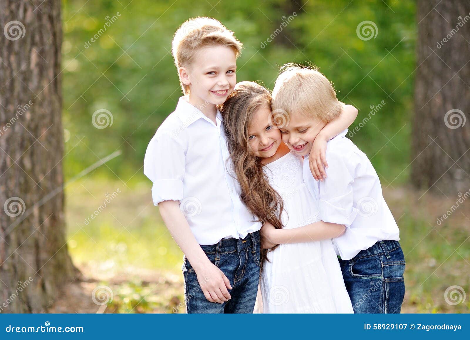 Three Children Playing on Meadow Stock Image - Image of funny, field ...