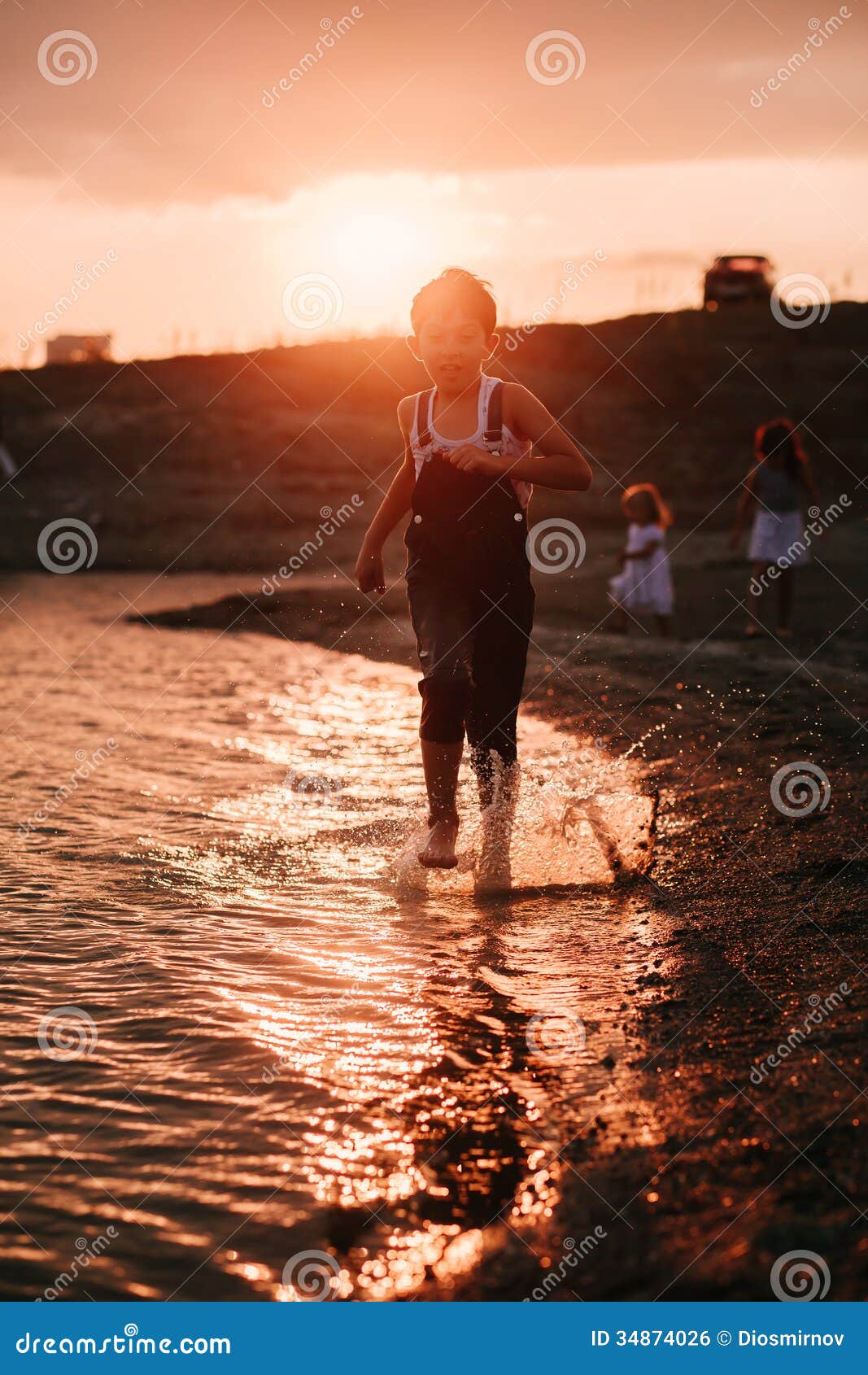 Three Children Running Along Beach Stock Photo - Image of caucasian ...