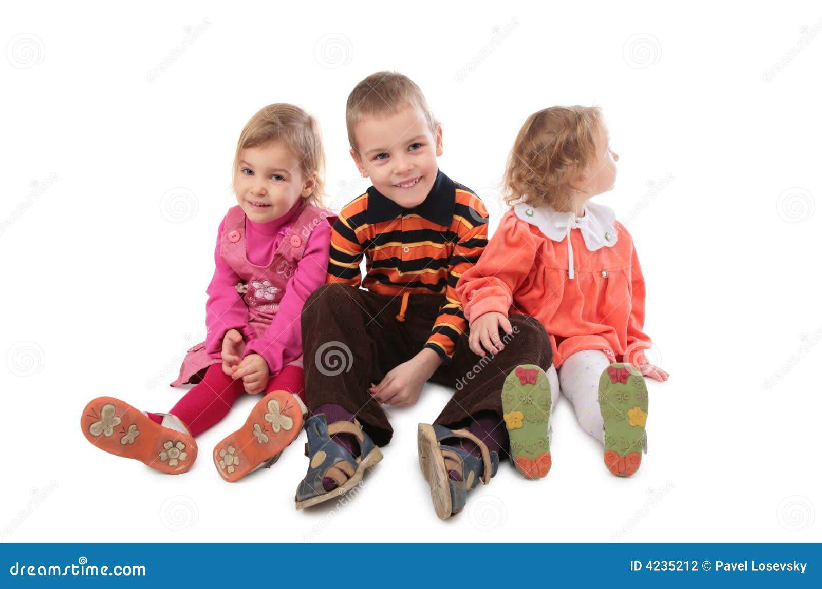 Three children sitting stock photo. Image of handsome - 4235212